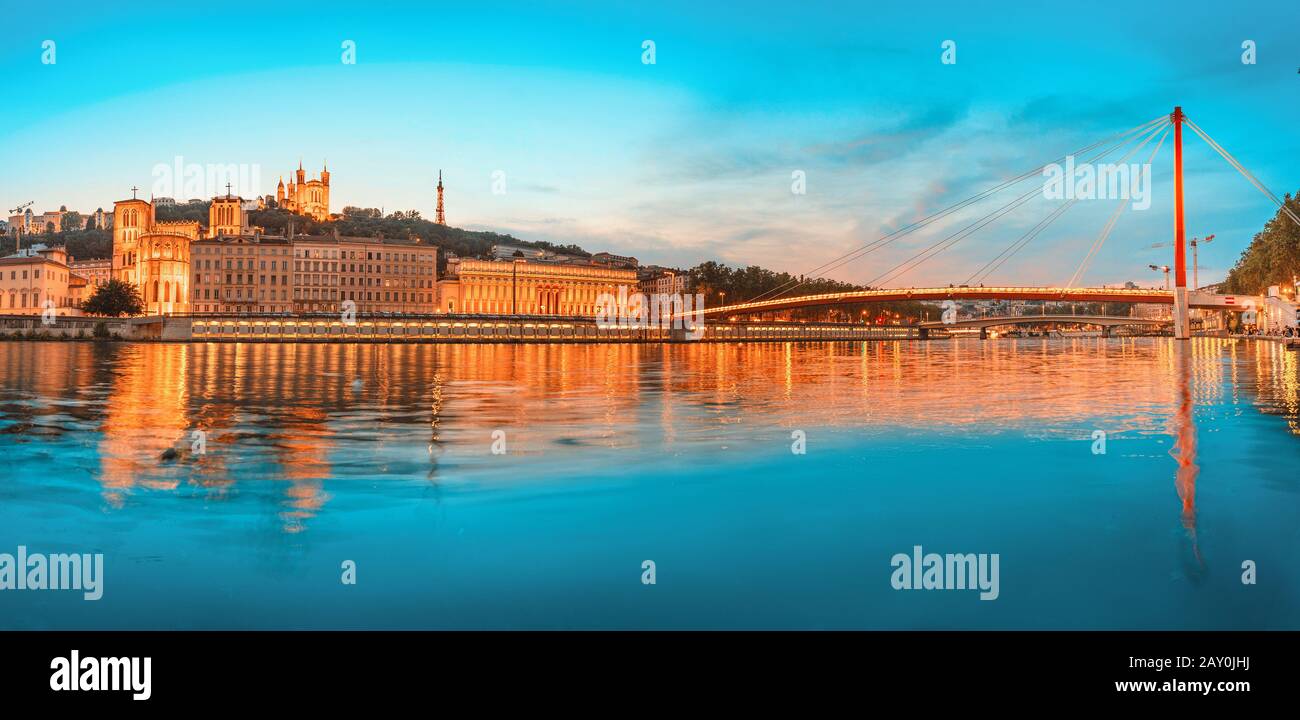 Lyon night cityscape with illuminated Courthouse and red pedestrian ...
