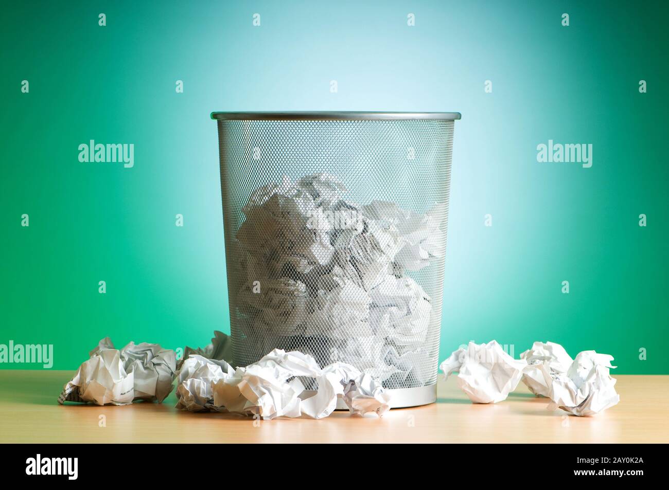 Garbage bin with paper waste isolated on white Stock Photo - Alamy