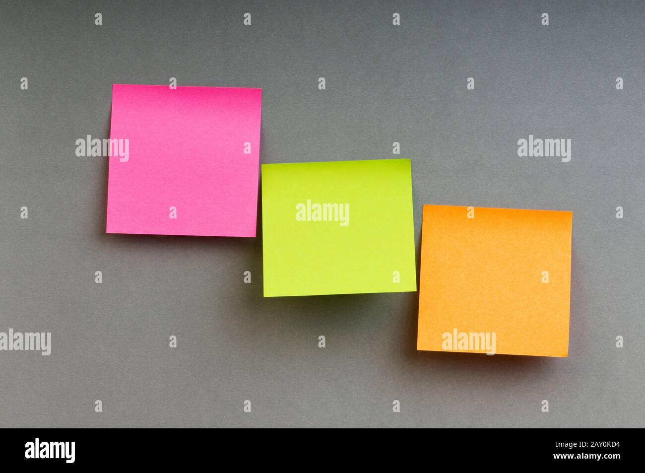 Reminder notes on the bright colorful paper Stock Photo - Alamy
