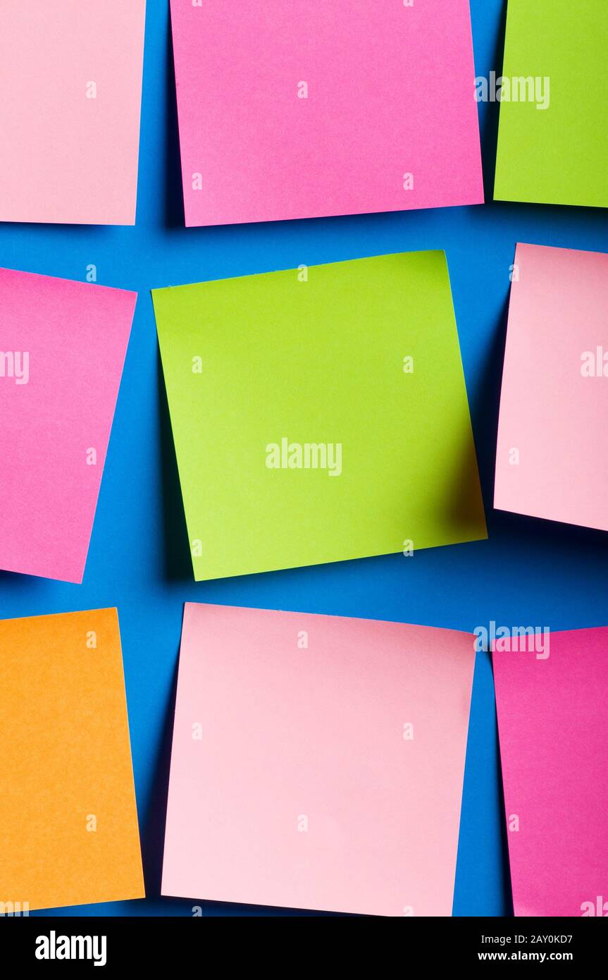 Reminder notes on the bright colorful paper Stock Photo - Alamy
