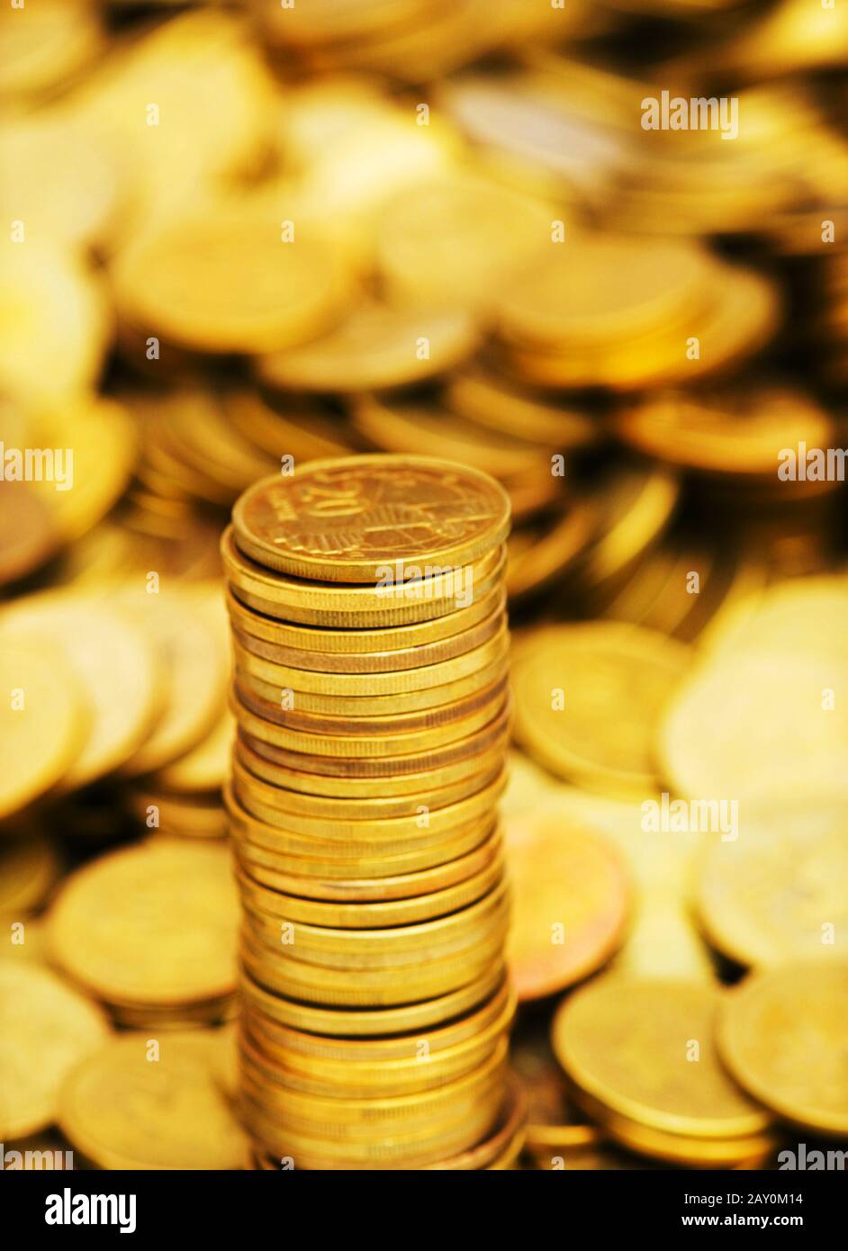 Stack of golden coins isolated on white Stock Photo - Alamy