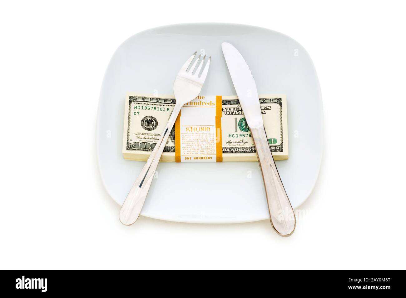 Financial concept - eating money isolated on white Stock Photo - Alamy