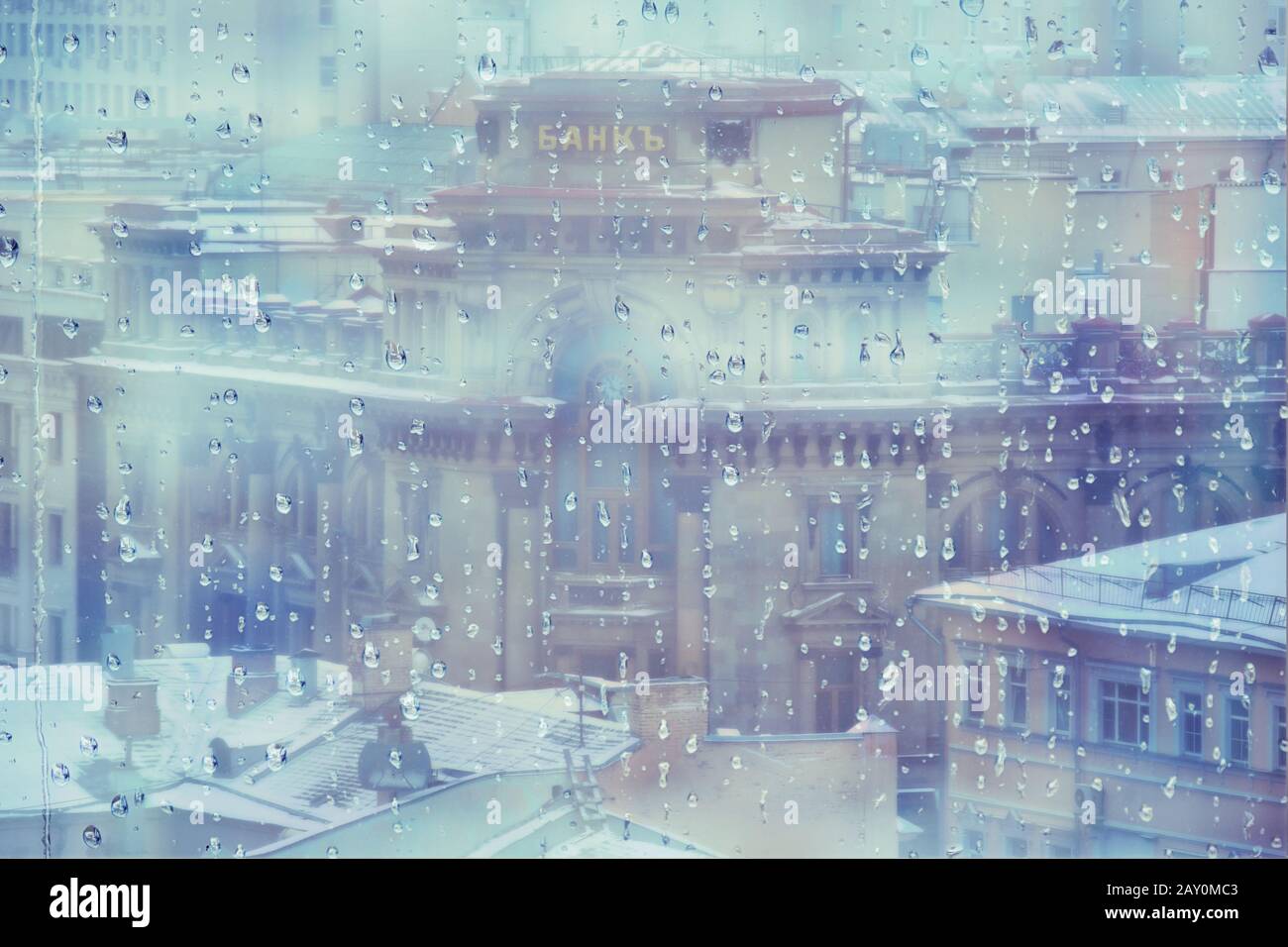 Moscow, Russia - 14 Feb 2020: Raindrops on window glass with old town ...