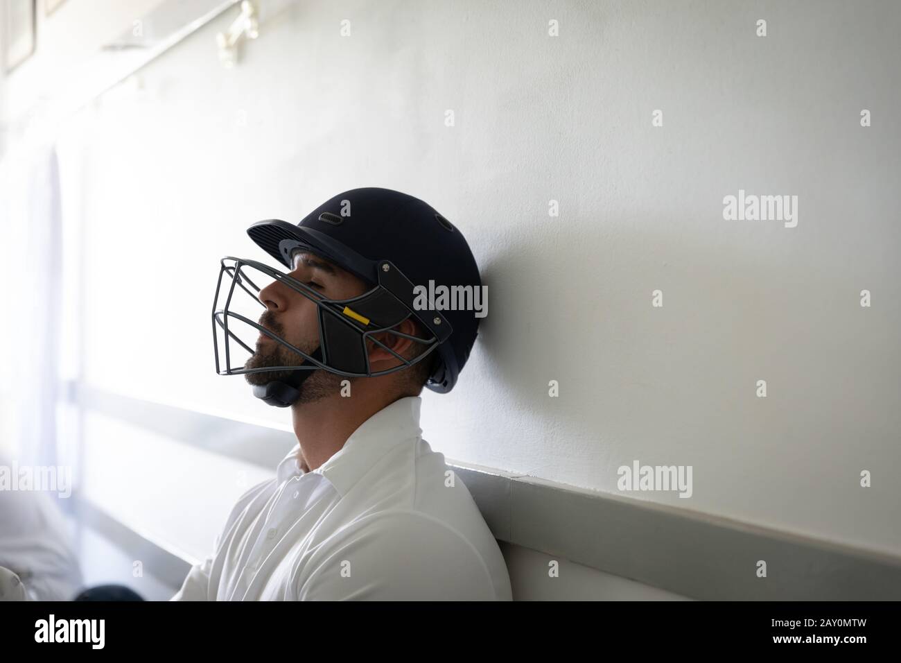 Cricket player waiting before playing Stock Photo - Alamy
