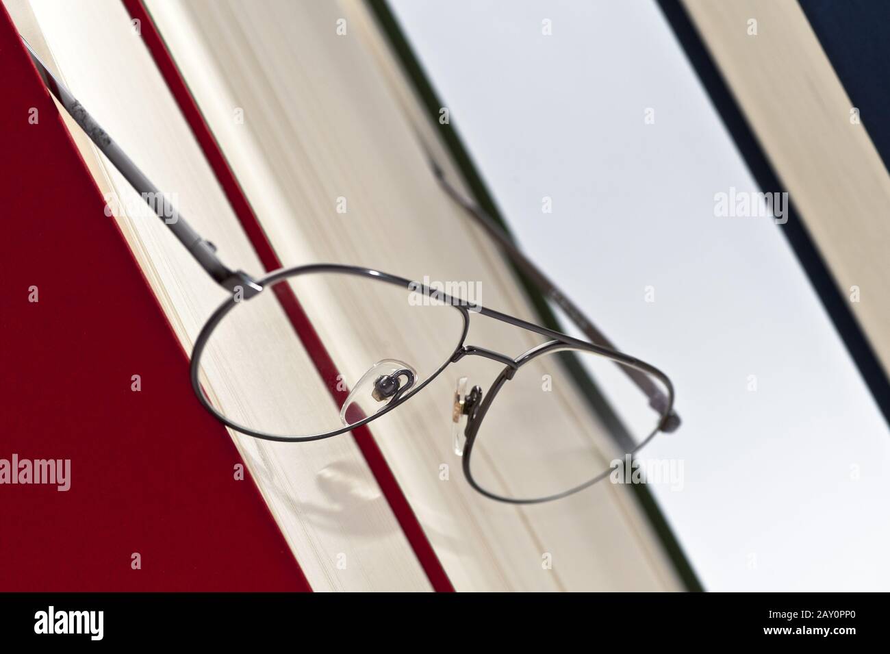 reading glasses with books Stock Photo - Alamy