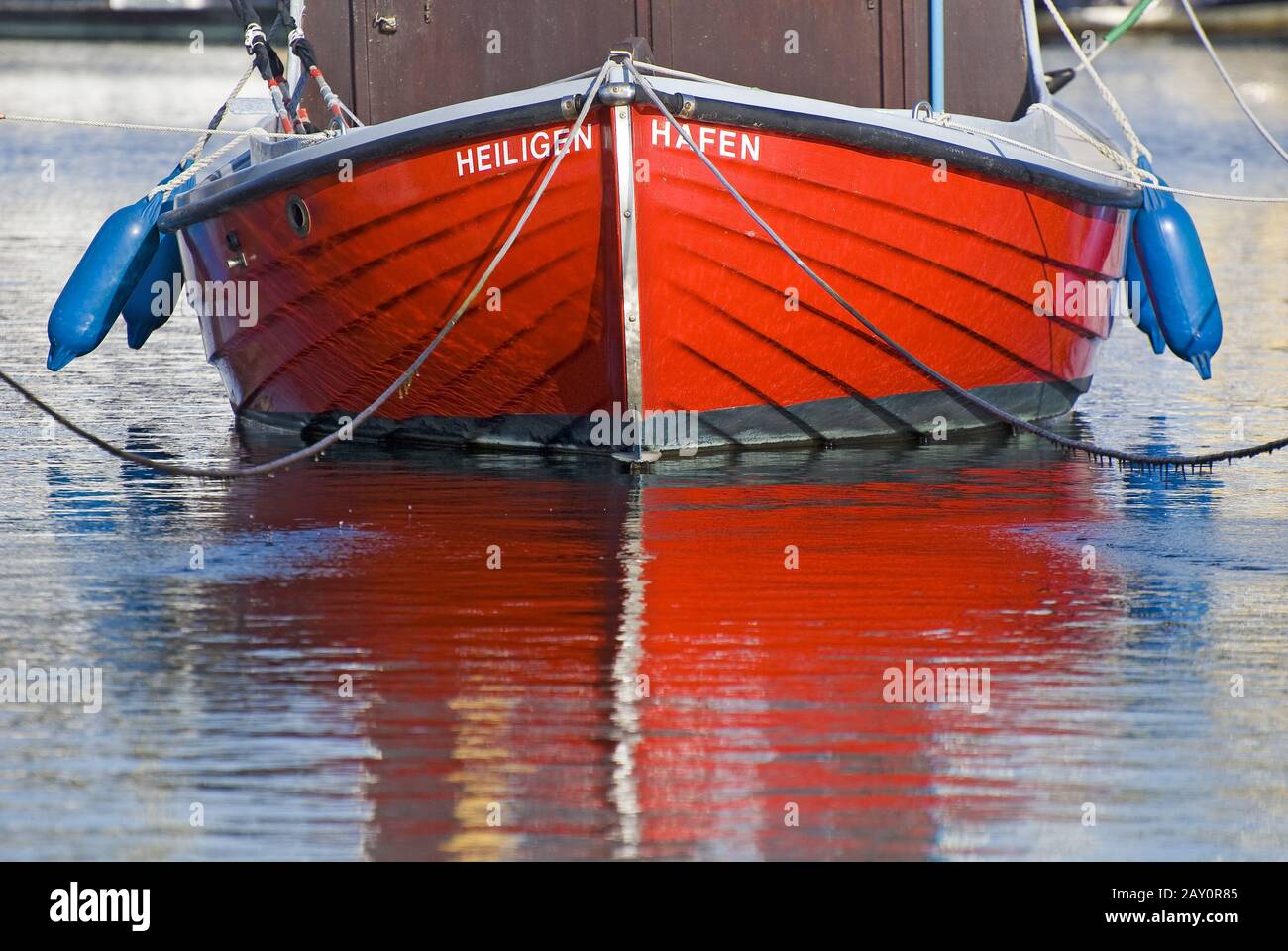 red wooden boat Stock Photo - Alamy