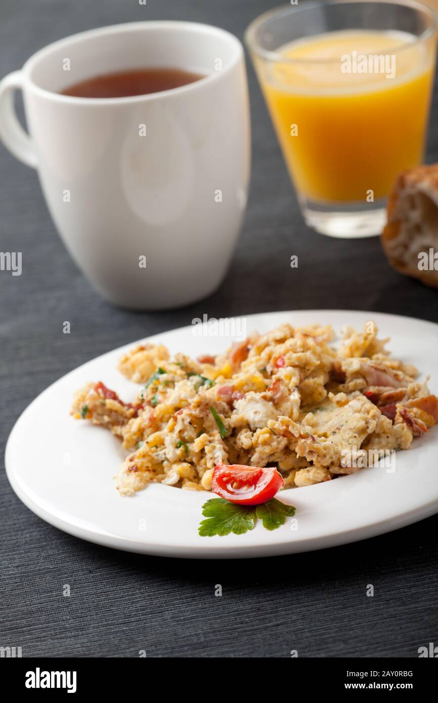 Scrambled eggs, tea and orange juice Stock Photo - Alamy