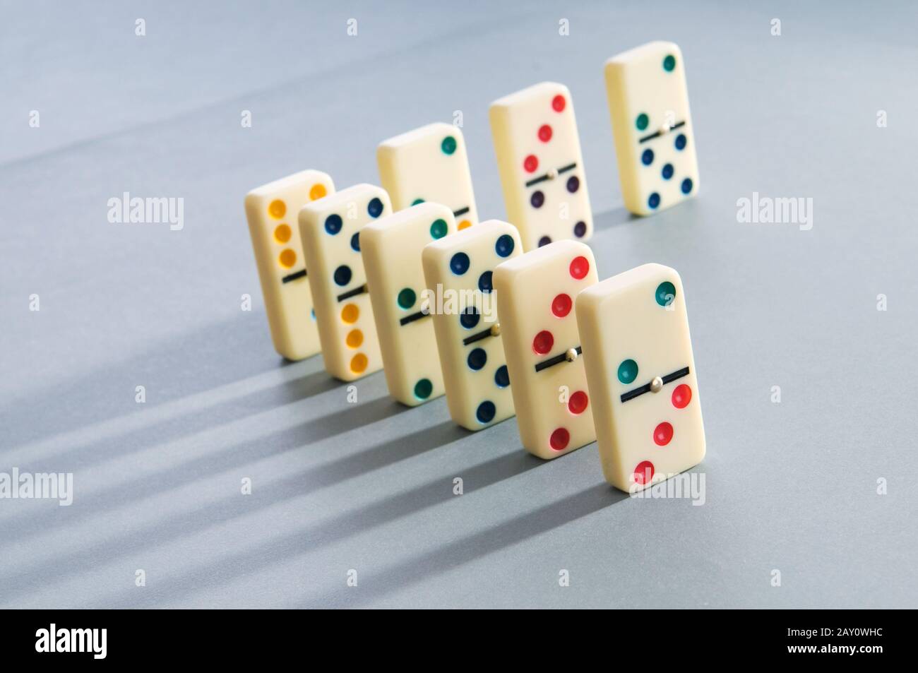 Domino effect falling chain sequence hi-res stock photography and ...
