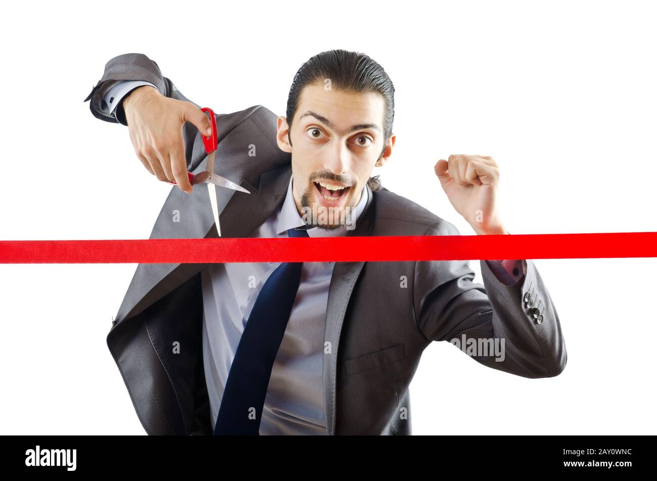 Businessman crossing finish line Stock Photo - Alamy