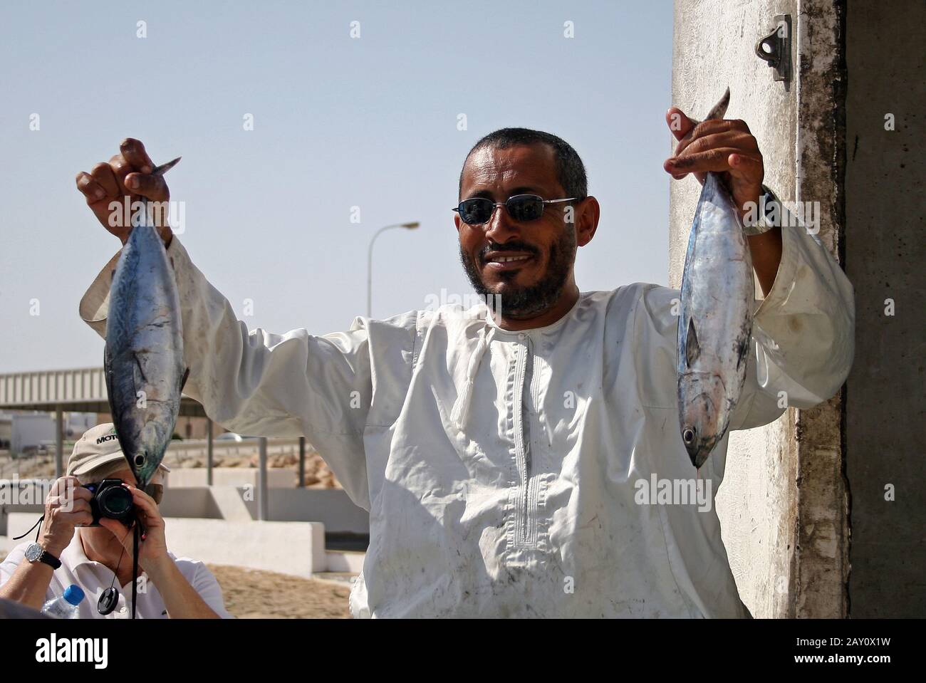 Fish traders in Oman Stock Photo - Alamy