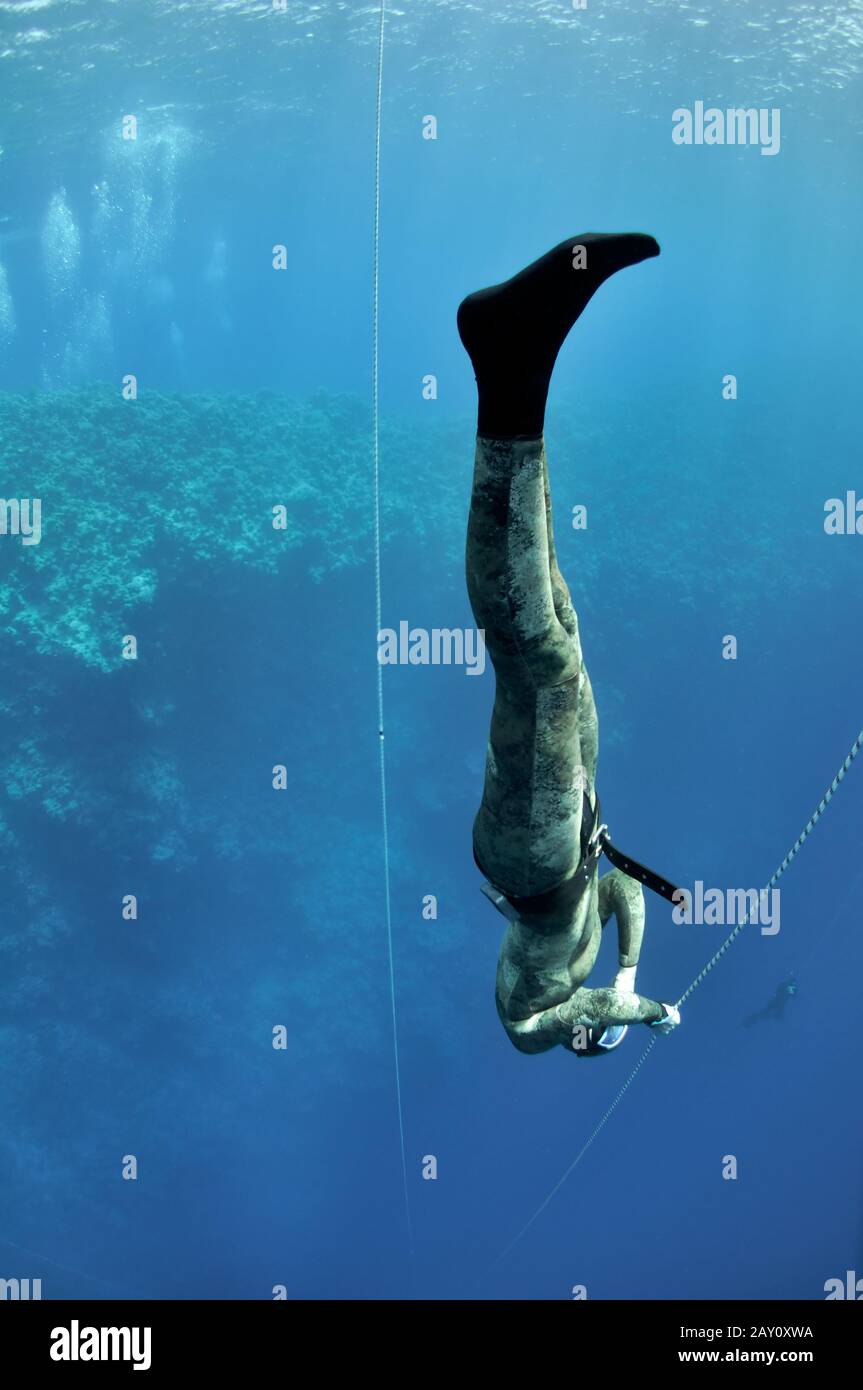 Big Foot scene of a freediving training Stock Photo - Alamy