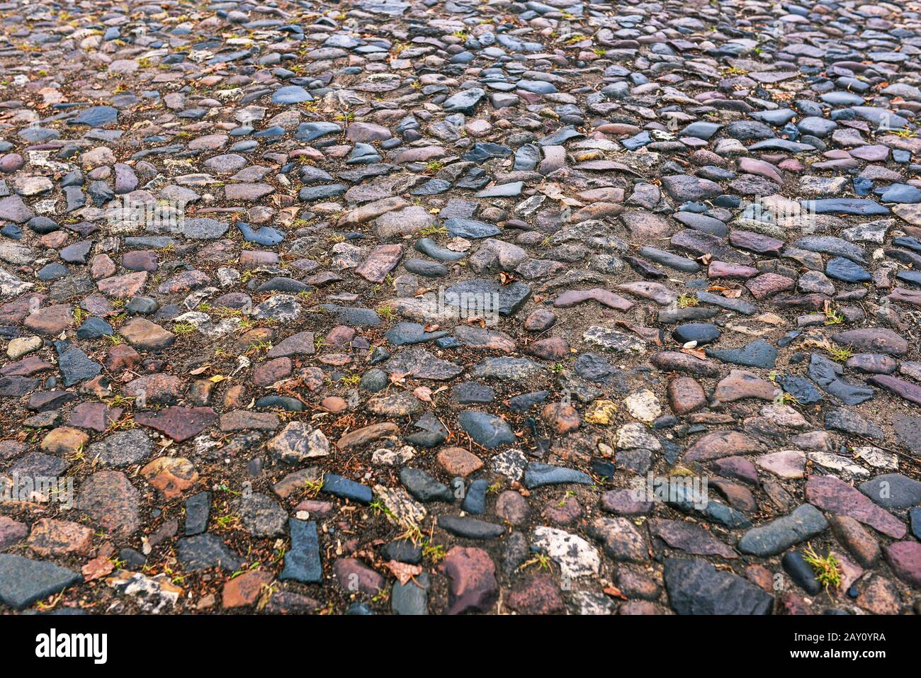 Cobblestone pavement texture. Panorama of the road from stone blocks ...
