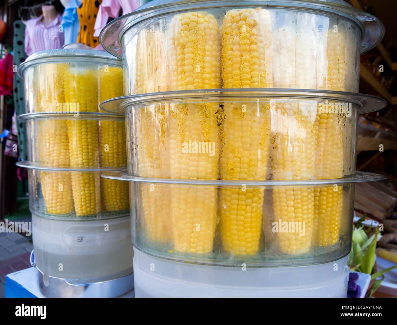 Hot boiled corn counter in a double boiler Stock Photo - Alamy