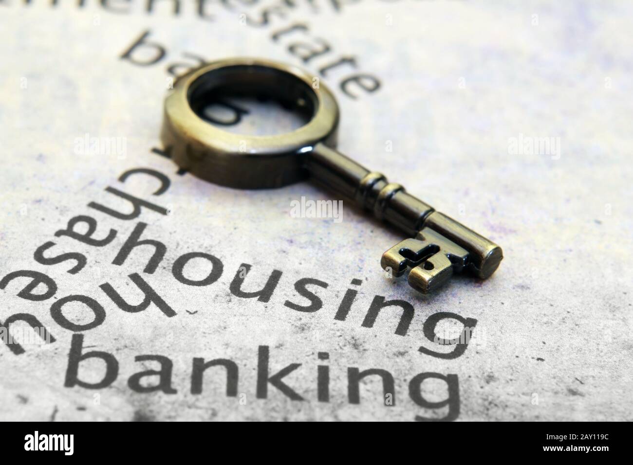 Old key on house text Stock Photo - Alamy