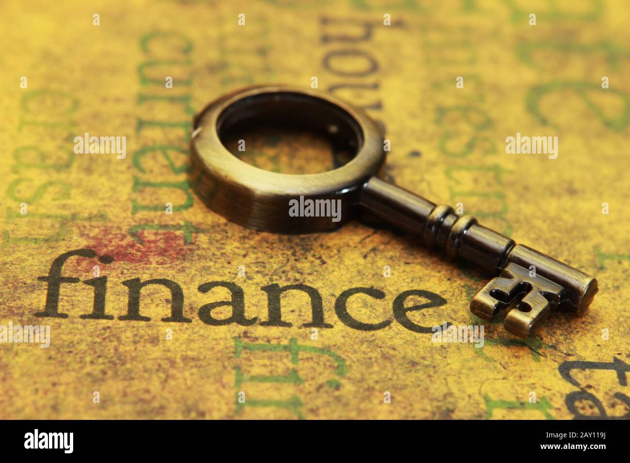 Finance and old key Stock Photo - Alamy