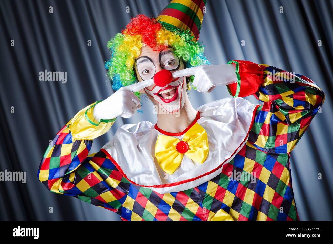 Funny clown in studio shooting Stock Photo - Alamy