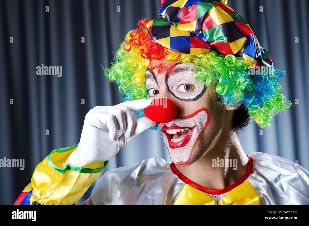 Funny clown in studio shooting Stock Photo - Alamy