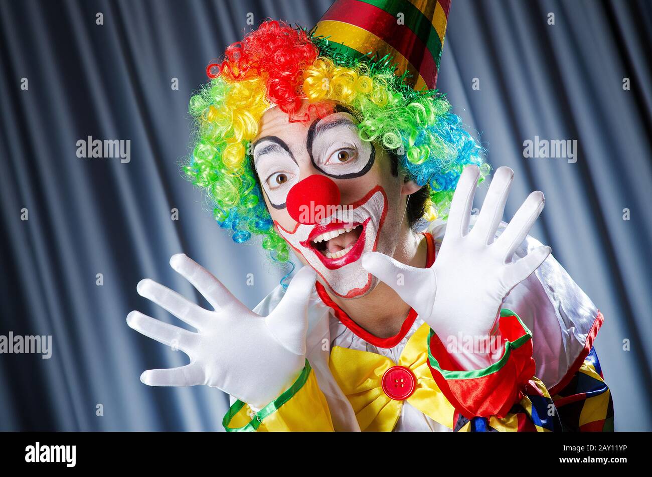 Funny clown in studio shooting Stock Photo - Alamy