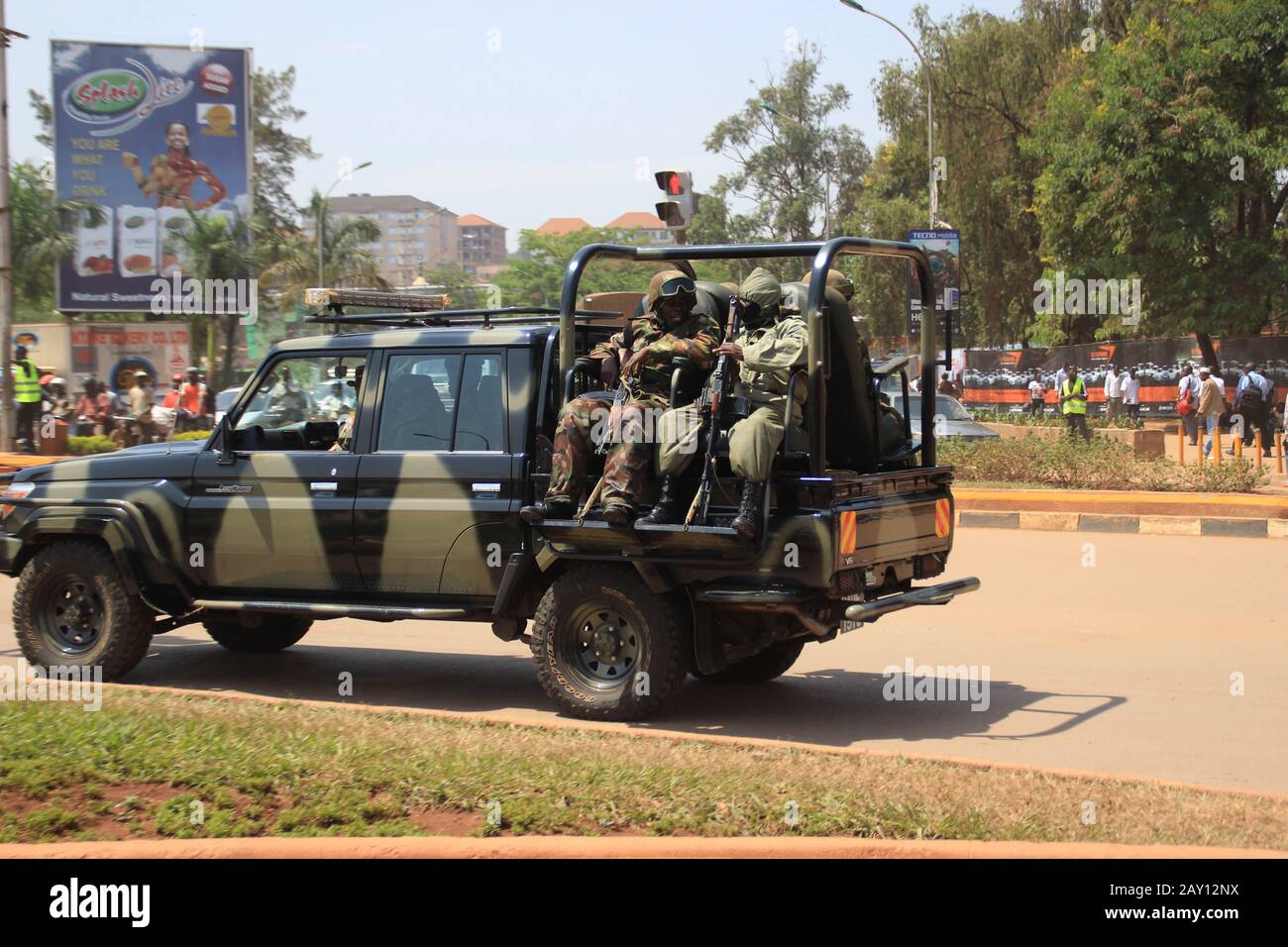 Kampala, Uganda - January 21, 2015: military vehicle with military with ...