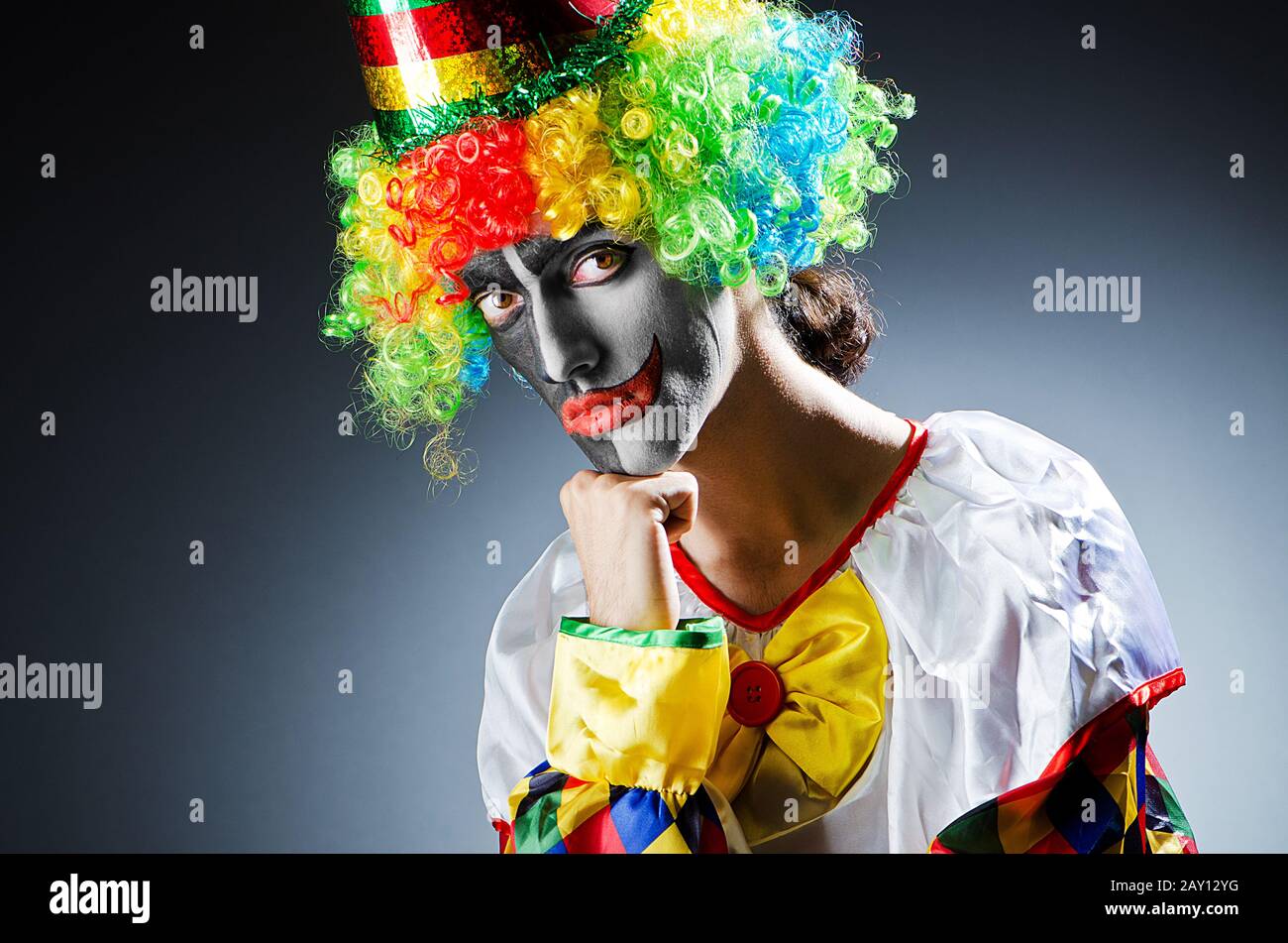 Funny clown in studio shooting Stock Photo - Alamy