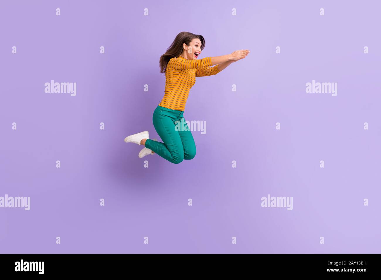 Full length body size view of nice attractive lovely cheerful cheery glad ecstatic girl jumping ...