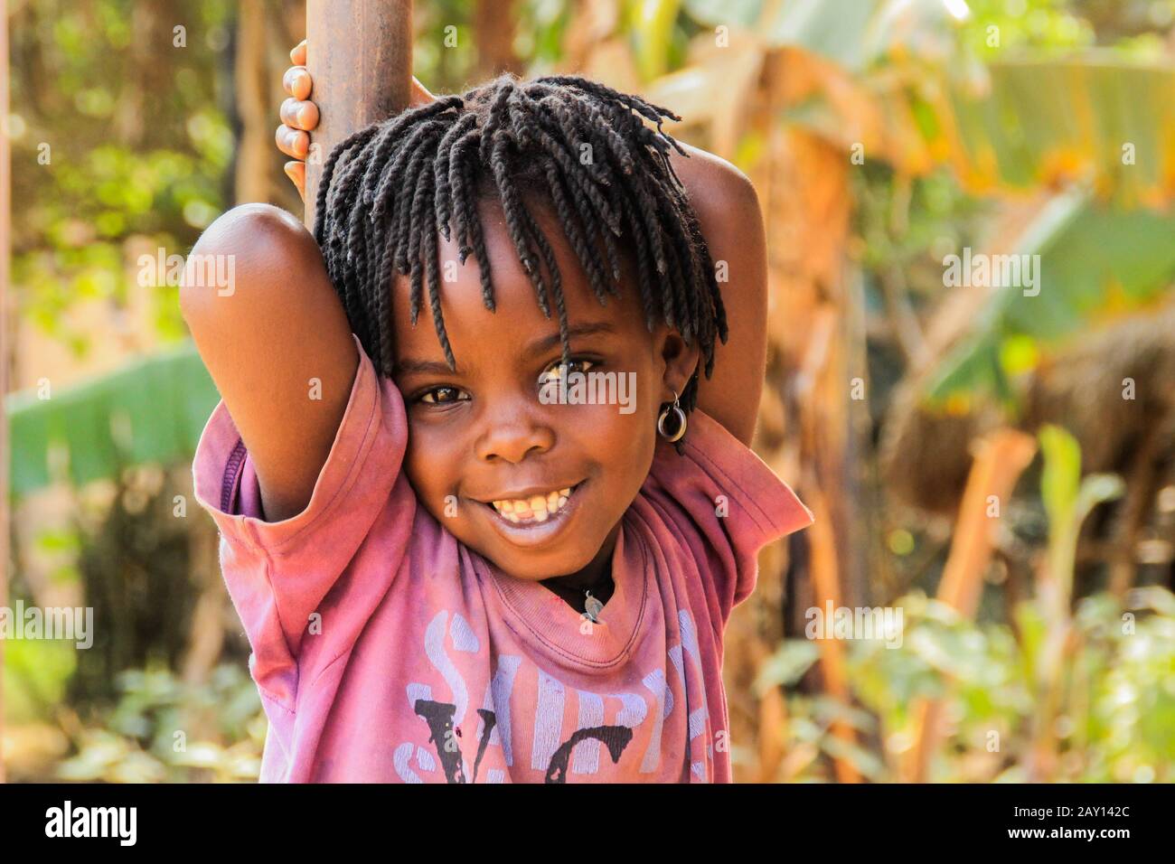Kampala, Uganda - January 26, 2018: Ugandan African girl with ...