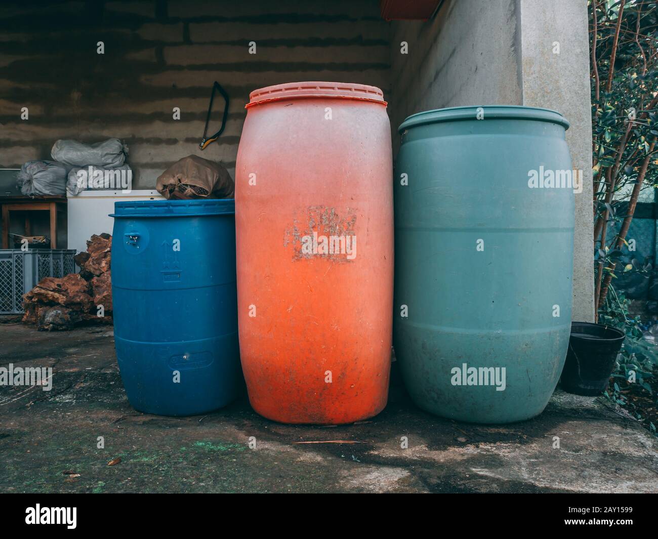 Vintage-style shot of metal containers of different colors in an ...