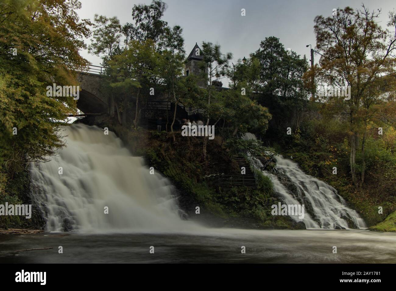 Beautiful scenery of a powerful waterfall flowing in a river in a ...