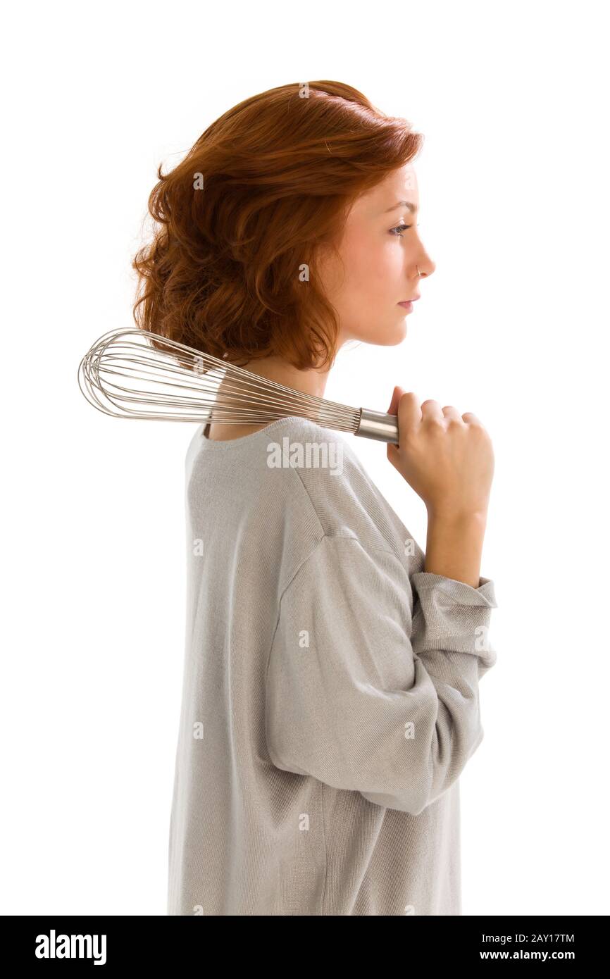 Girl with a whisk Stock Photo - Alamy