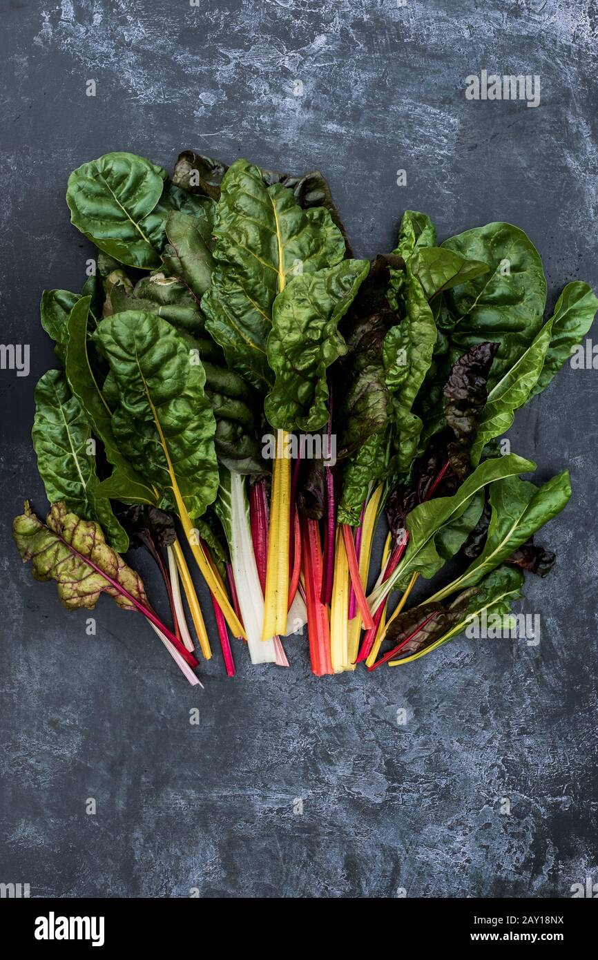 High angle close up of a bunch of freshly picked Swiss rainbow chard on ...