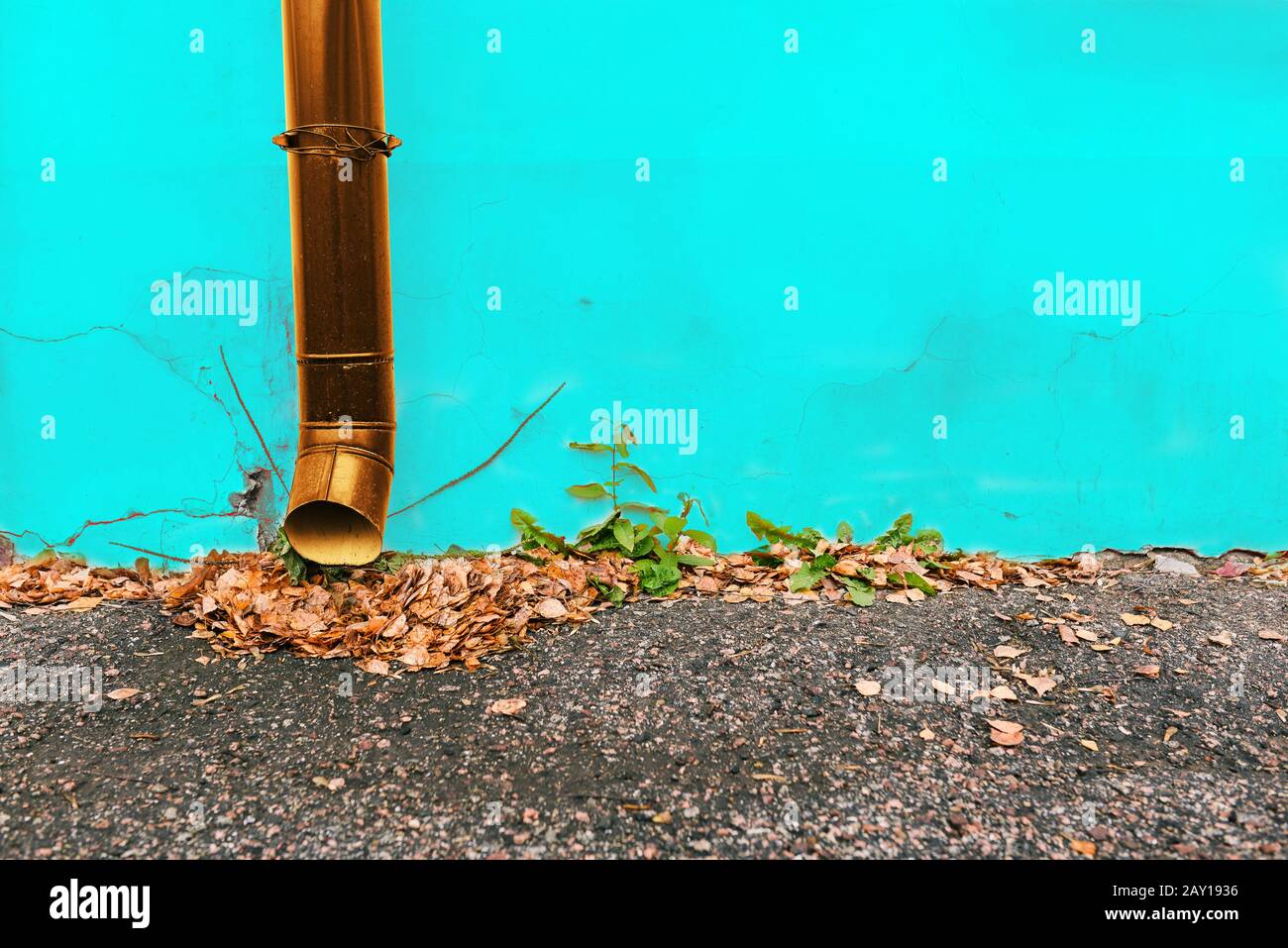 A big blue color water supply main pipeline with a stopcock valve ...