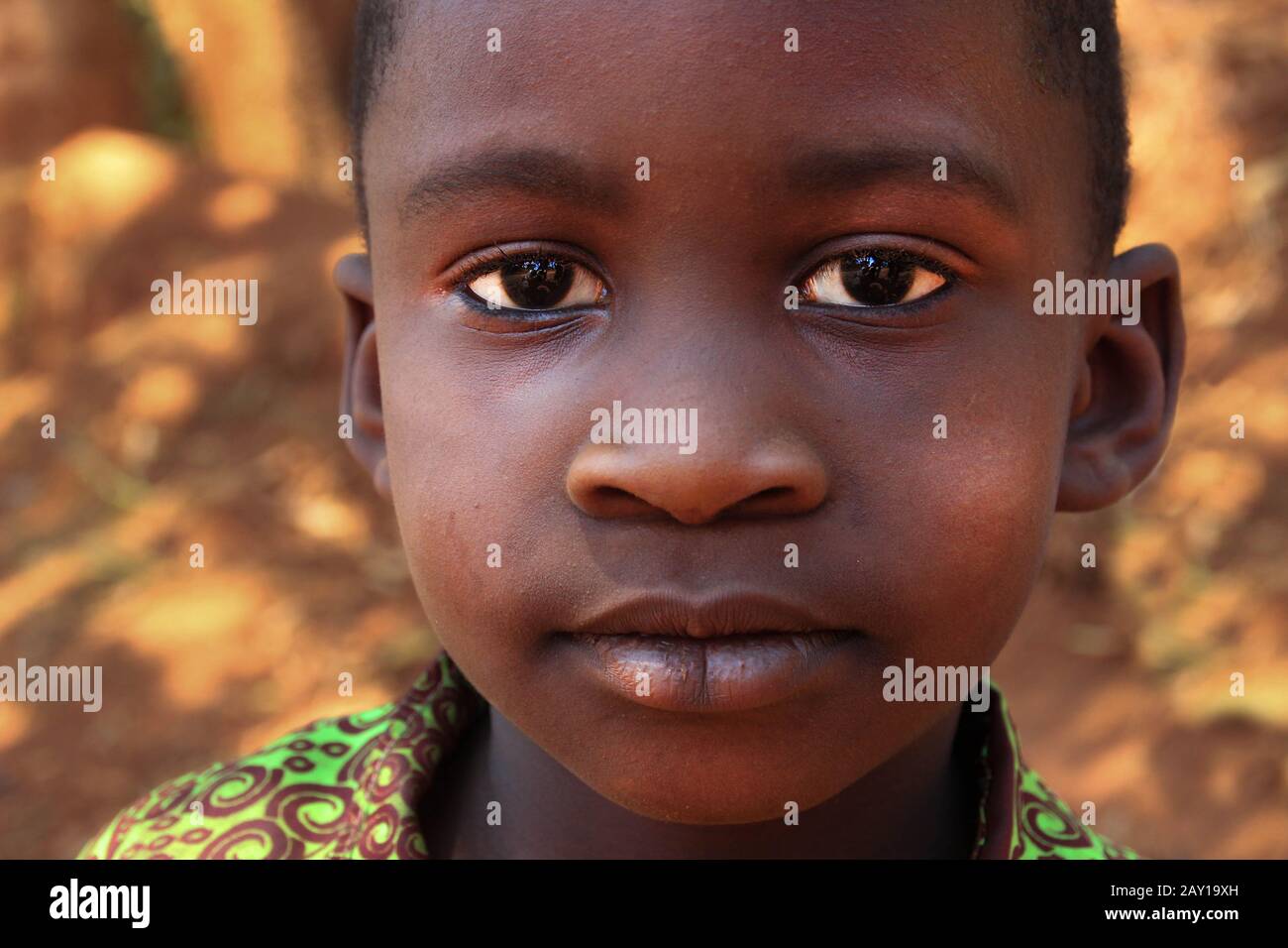 Kampala, Uganda - January 27, 2015: potraite of African village boy ...
