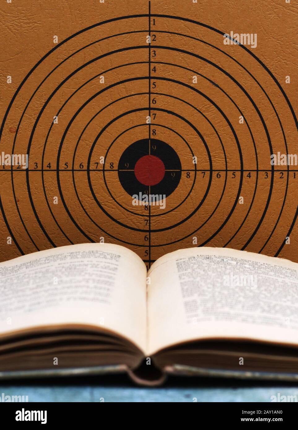 Book and target concept Stock Photo - Alamy