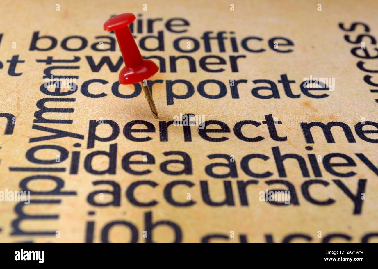 Push pin on perfect text Stock Photo - Alamy