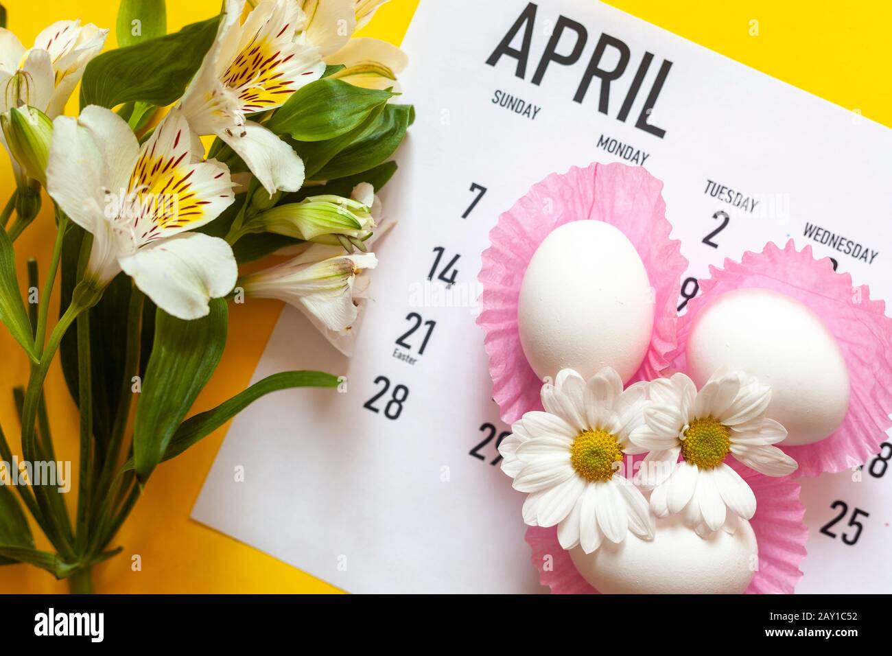 April 2020 monthly calendar with three colorful easter eggs and spring ...