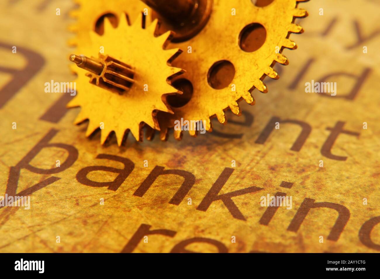 Old gear on Banking text Stock Photo - Alamy
