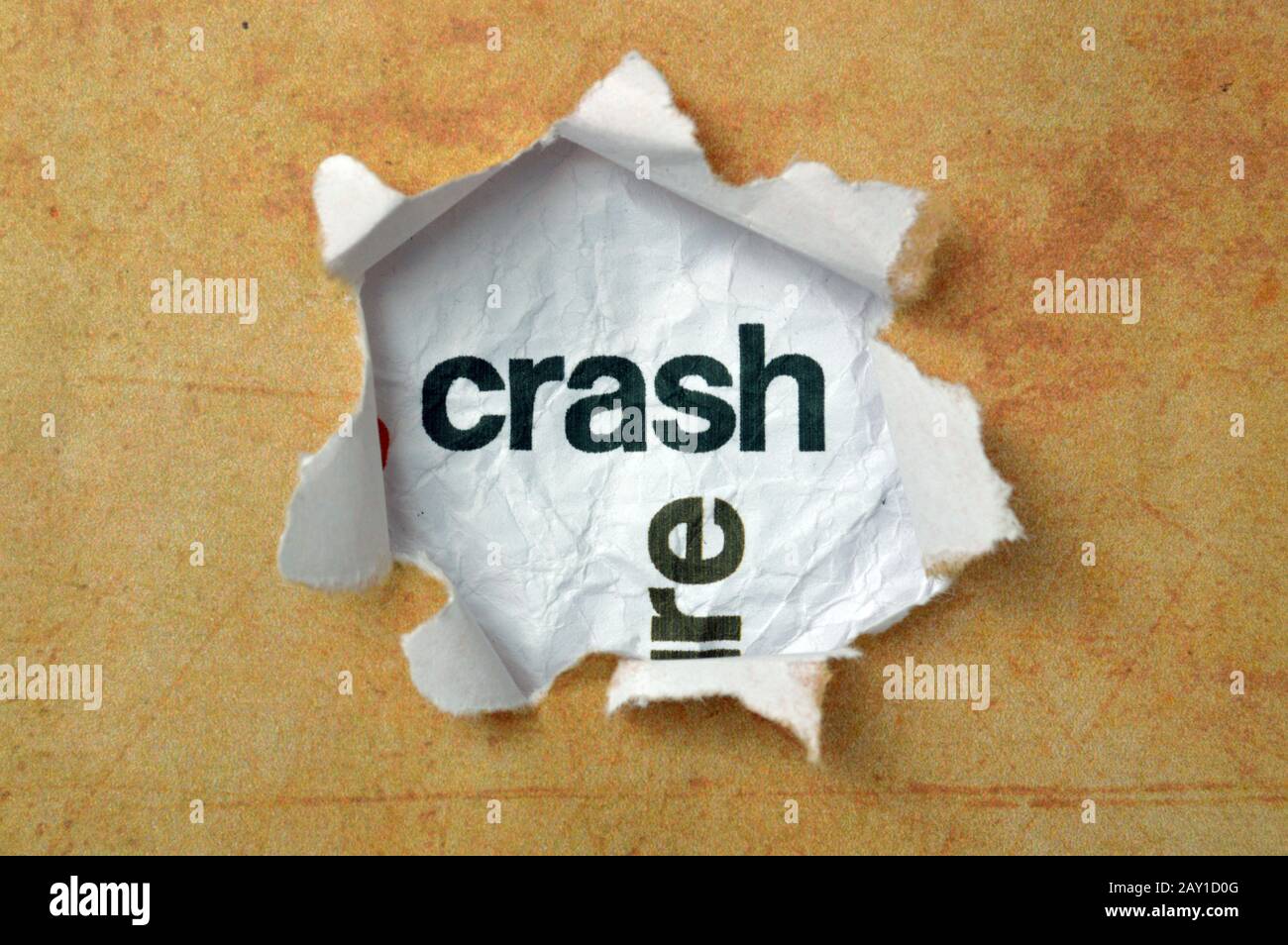 Crash concept on paper hole Stock Photo - Alamy