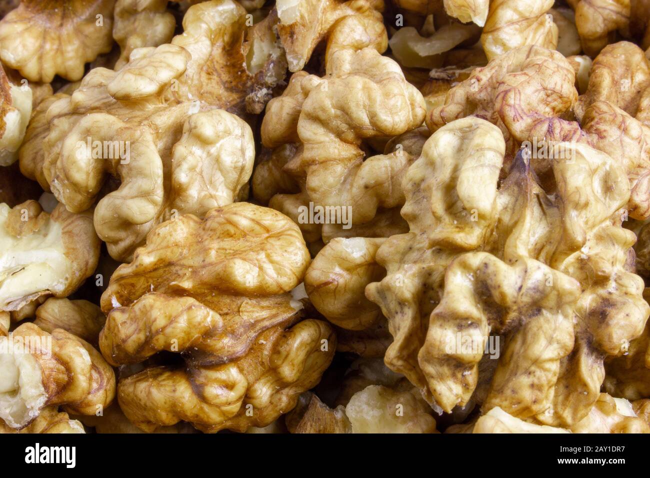 Background texture of walnut kernels. Nut butterflies Stock Photo - Alamy
