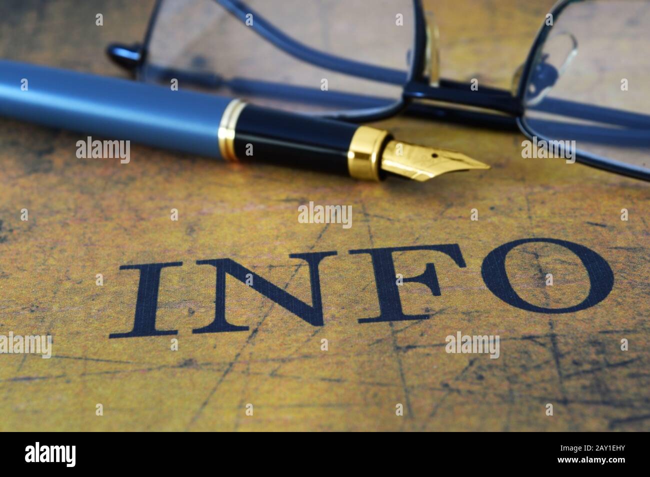 Pen on info text Stock Photo - Alamy