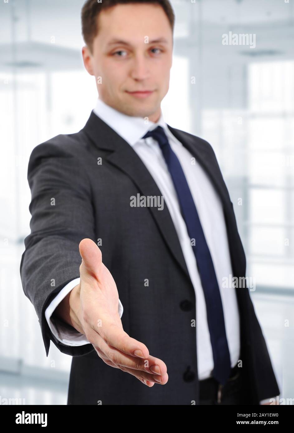Business man shake hand and greeting you Stock Photo - Alamy
