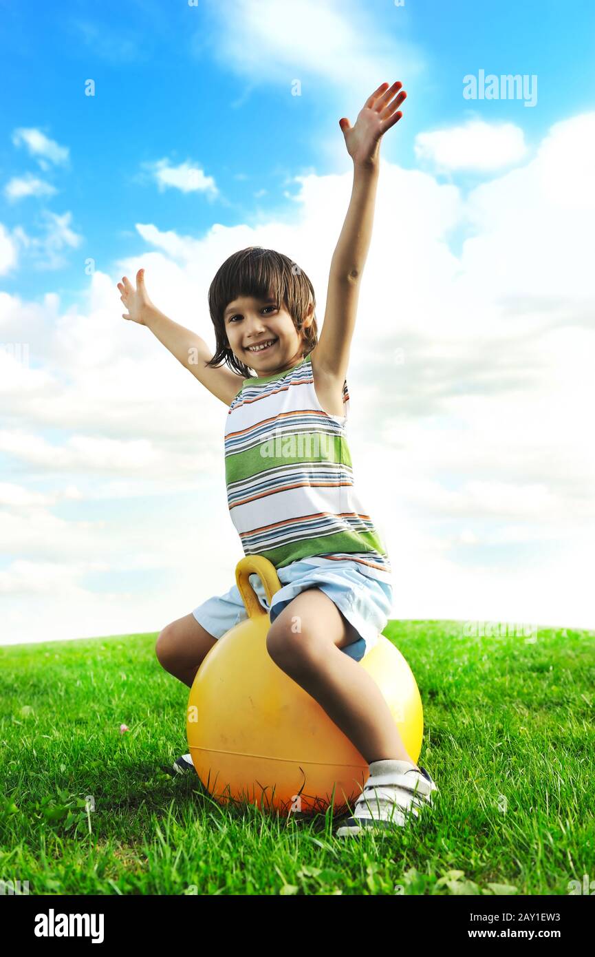 Sporty cute positive kid Stock Photo - Alamy