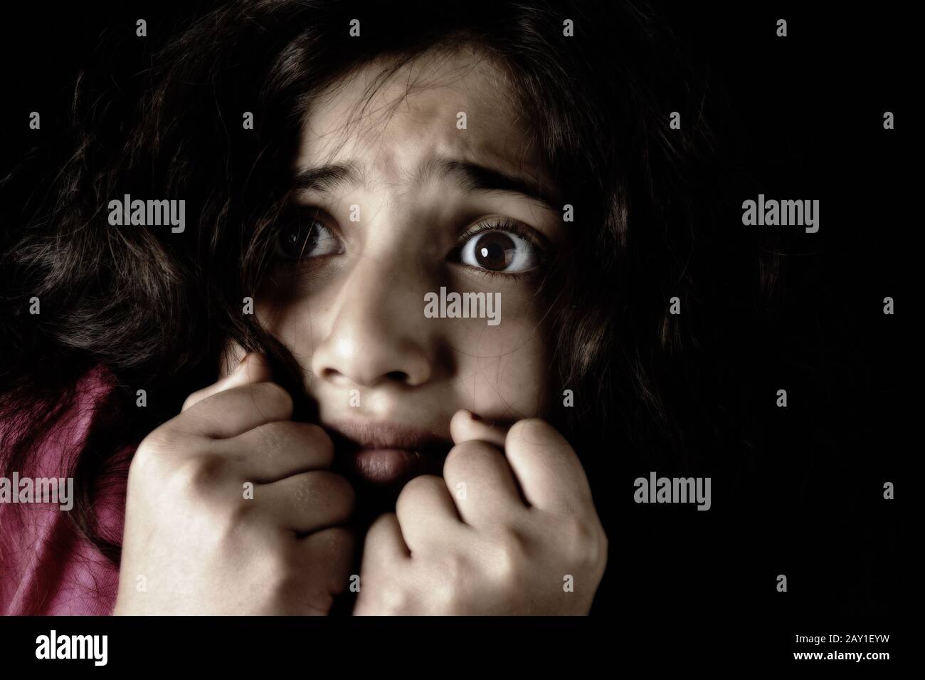 Low Key Shot of a Scared and Filthy Brown Haired Child Stock Photo - Alamy