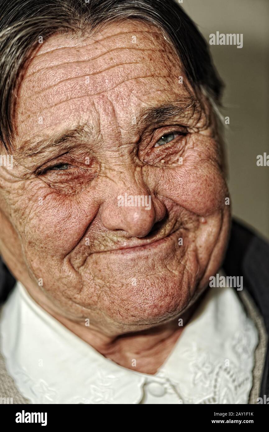 Closeup portrait of elderly happy woman smiling Stock Photo - Alamy
