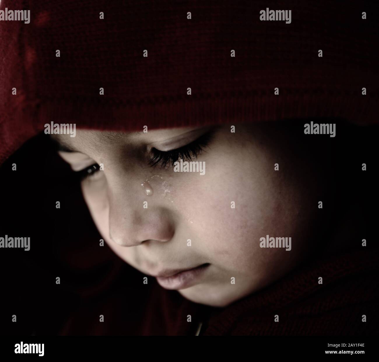 Sad child crying Stock Photo - Alamy