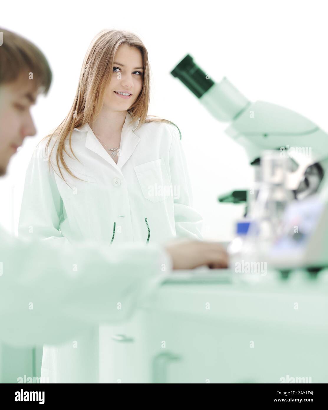 Two students standing laboratory hi-res stock photography and images ...