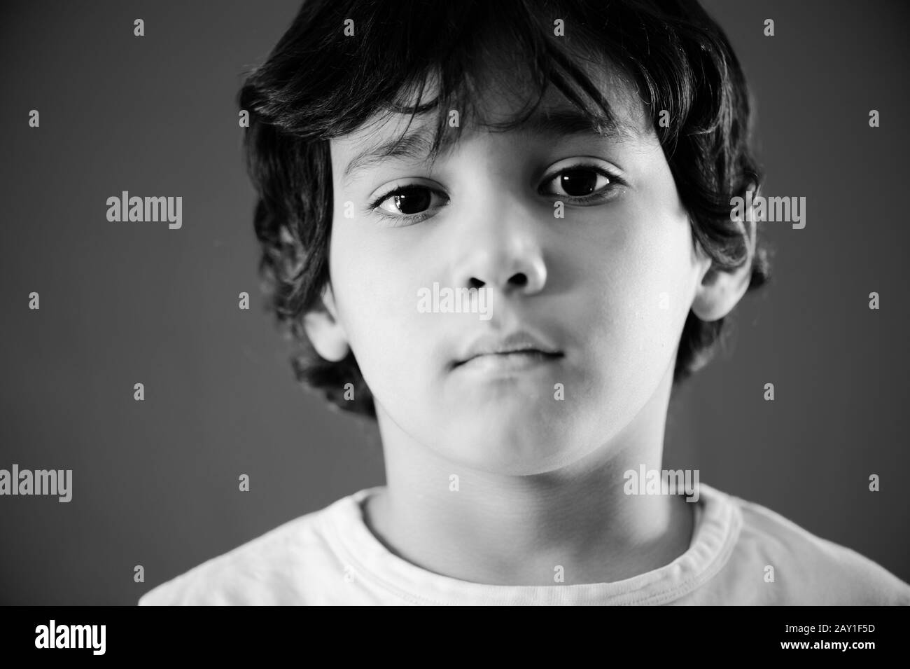 Serious little boy Stock Photo - Alamy