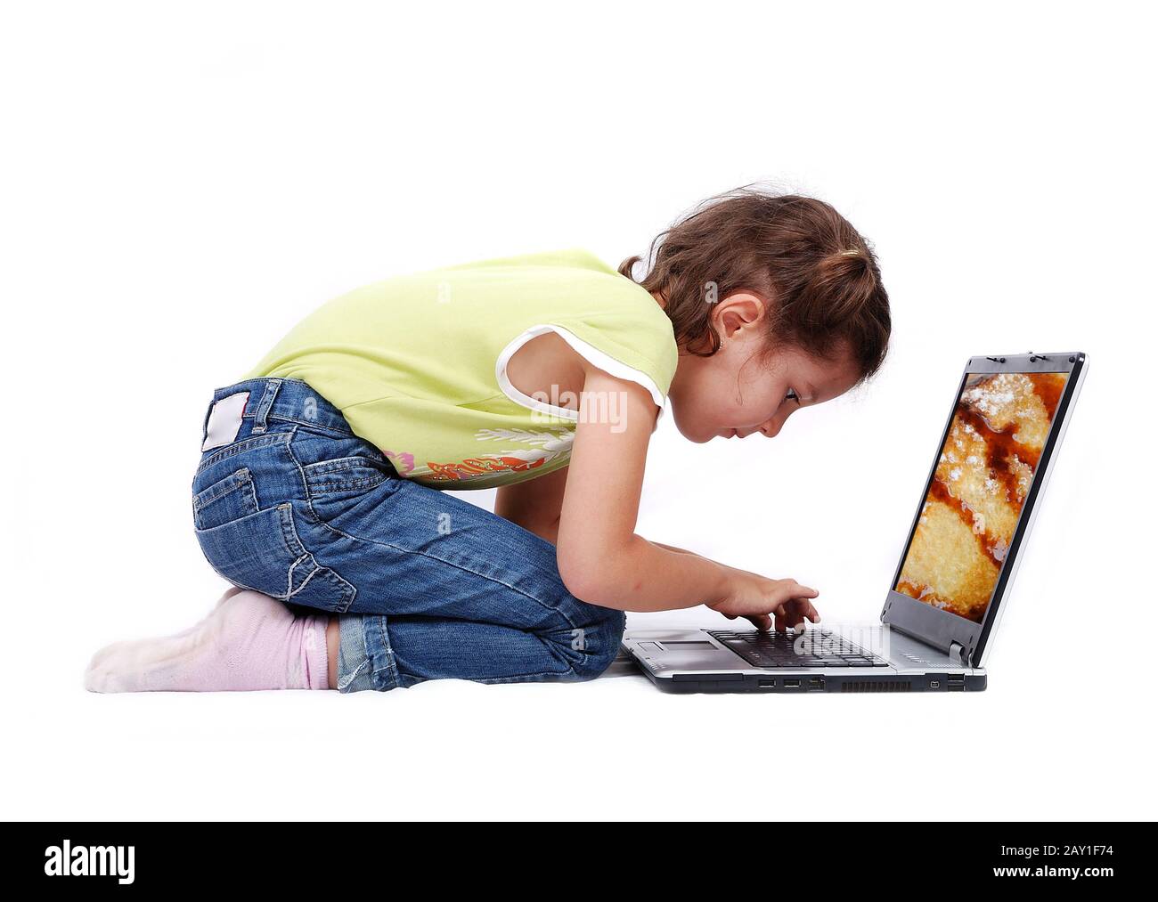 happy young girl with laptop computer isolated Stock Photo - Alamy