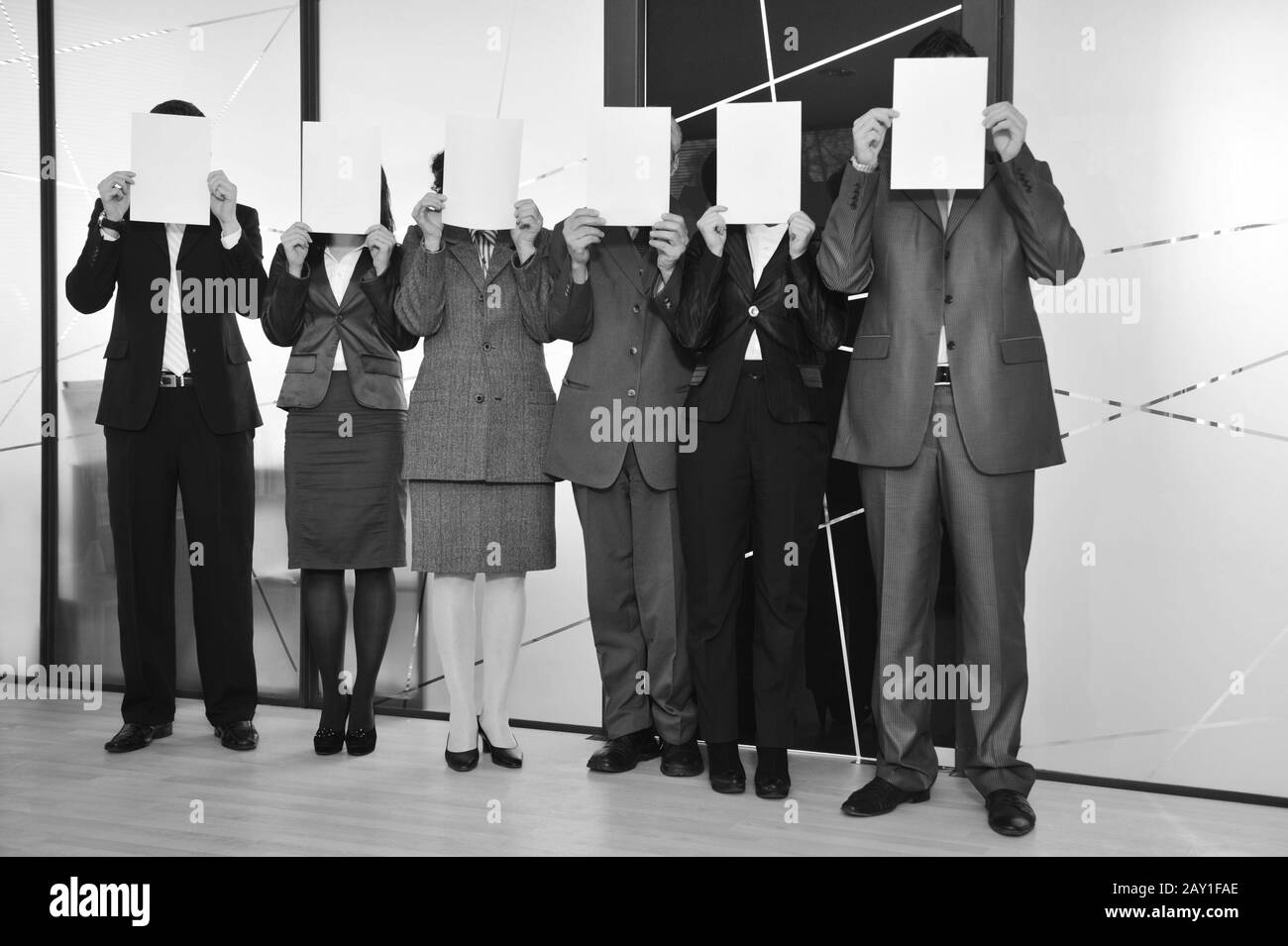 Young businessman holding modern Black and White Stock Photos & Images ...