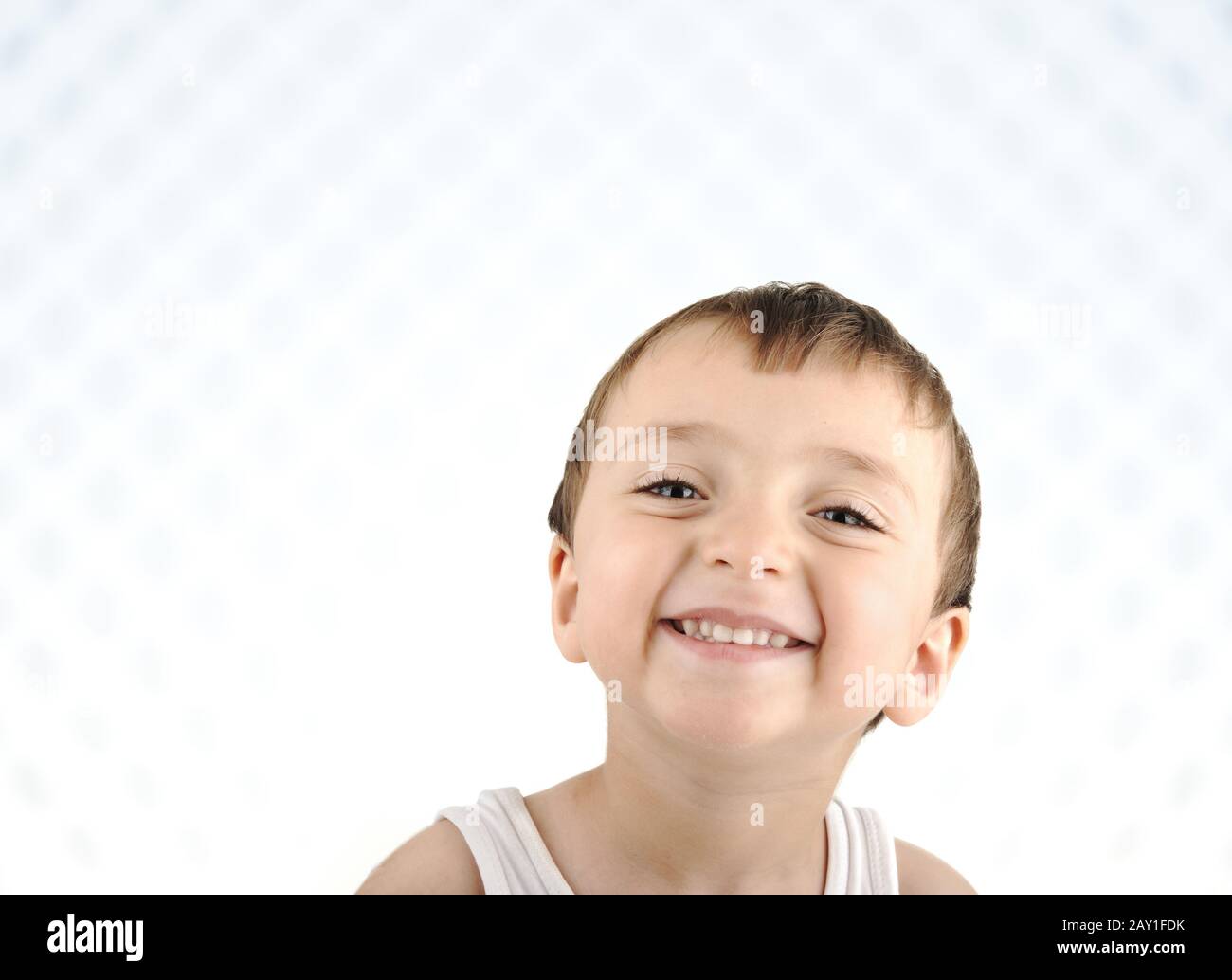 Portrait of an innocent kid giving you a cute smile Stock Photo - Alamy