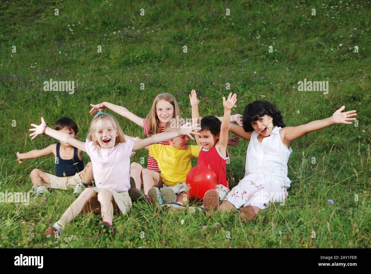 happy children raising hands upwards Stock Photo - Alamy